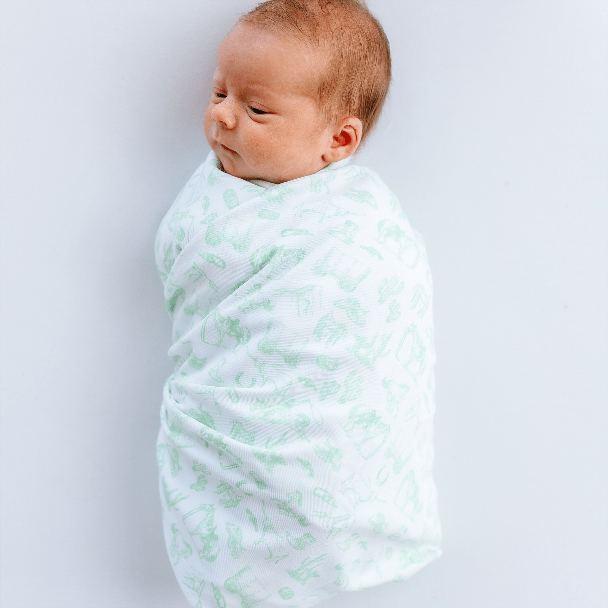 Wild West Toile Swaddle Blanket - Celery – Magnolia Baby